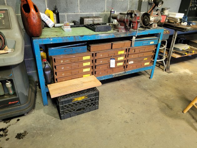 Metal Work Bench w/ metal storage bins and contents